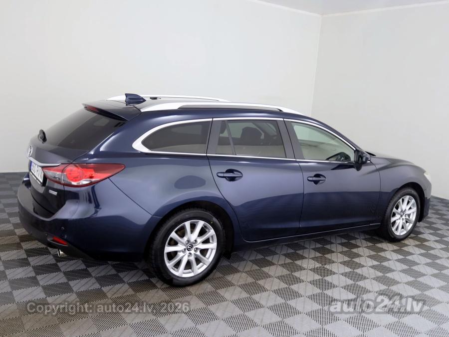 Blue Mazda 6 2014 in Tallinn, with an engine capacity of 2.20 L and mileage of 246 thousand km for 3999 €, photo 4 on AUTOMOTO.COM.LV