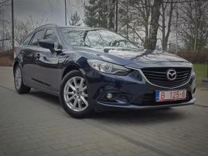 Blue Mazda 6 2014 in Riga, with an engine capacity of 2.20 L and mileage of 287 thousand km for 4590 €, photo 4 on AUTOMOTO.COM.LV