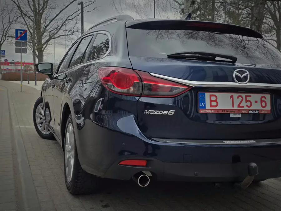 Blue Mazda 6 2014 in Riga, with an engine capacity of 2.20 L and mileage of 287 thousand km for 4590 €, photo 6 on AUTOMOTO.COM.LV