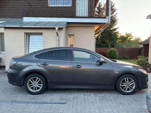 Brown Mazda 6 2011 in Kaunas, with an engine capacity of 2.18 L and mileage of 329 thousand km for 2750 €, photo 5 on AUTOMOTO.COM.LV