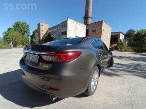 Brown Mazda 6 2016 in Jekabpils, with an engine capacity of 2.00 L and mileage of 198 thousand km for 8400 €, photo 14 on AUTOMOTO.COM.LV