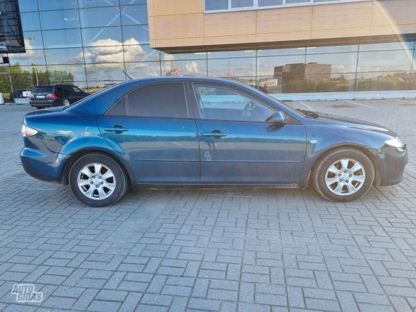Green Mazda 6 2008 in Kaunas, with an engine capacity of 1.80 L and mileage of 308 thousand km for 850 €, photo 6 on AUTOMOTO.COM.LV