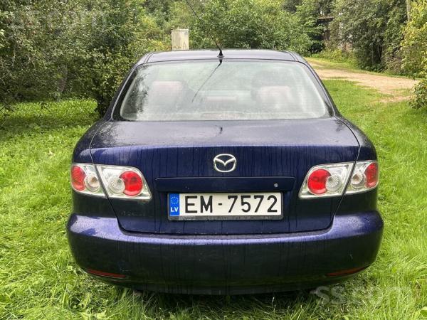 Grey Mazda 6 2002 in Riga, with an engine capacity of 2.30 L and mileage of 166 thousand km for 1550 €, photo 6 on AUTOMOTO.COM.LV