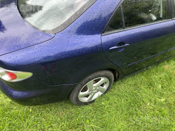 Grey Mazda 6 2002 in Riga, with an engine capacity of 2.30 L and mileage of 166 thousand km for 1550 €, photo 8 on AUTOMOTO.COM.LV