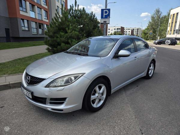 Pelēks Mazda 6 2009 Viļņa, ar dzinēja tilpumu 1.80 L un nobraukumu 202 tūkst. km par 1000 €, foto 1 vietnē AUTOMOTO.COM.LV