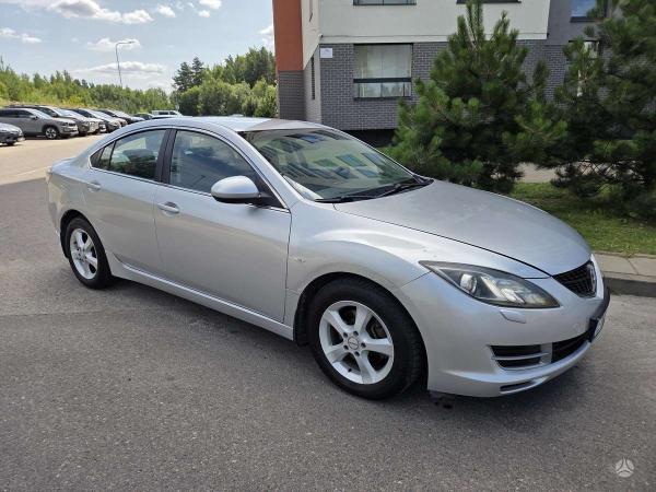 Pelēks Mazda 6 2009 Viļņa, ar dzinēja tilpumu 1.80 L un nobraukumu 202 tūkst. km par 1000 €, foto 5 vietnē AUTOMOTO.COM.LV