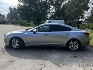 Grey Mazda 6 2013 in Riga, with an engine capacity of 2.20 L and mileage of 276 thousand km for 6250 €, photo 6 on AUTOMOTO.COM.LV