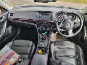 Grey Mazda 6 2014 in Jonava, with an engine capacity of 2.18 L and mileage of 105 thousand km for 2399 €, photo 16 on AUTOMOTO.COM.LV
