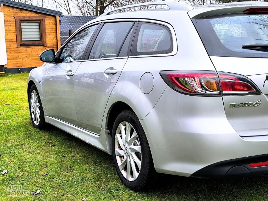 Grey Mazda 6 2010 in Vilnius, with an engine capacity of 2.20 L and mileage of 256 thousand km for 2899 €, photo 12 on AUTOMOTO.COM.LV