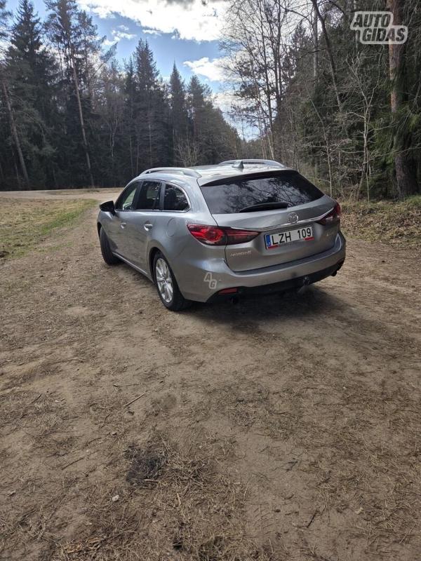 Grey Mazda 6 2014 in Panevezys, with an engine capacity of 2.20 L and mileage of 270 thousand km for 6300 €, photo 5 on AUTOMOTO.COM.LV