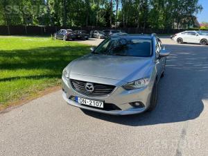 Grey Mazda 6 2014 in Riga, with an engine capacity of 2.20 L and mileage of 214 thousand km for 7650 €, photo 12 on AUTOMOTO.COM.LV