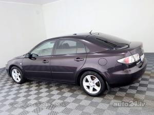 Red Mazda 6 2006 in Tallinn, with an engine capacity of 2.00 L and mileage of 279 thousand km for 1099 €, photo 5 on AUTOMOTO.COM.LV