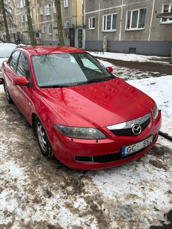 Red Mazda 6 2006 in Riga, with an engine capacity of 2.00 L and mileage of 196 thousand km for 750 €, photo 6 on AUTOMOTO.COM.LV