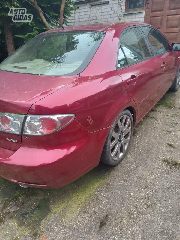 Sarkans Mazda 6 2006 Kretinga, ar dzinēja tilpumu 3.00 L un nobraukumu 250 tūkst. km par 1200 €, foto 6 vietnē AUTOMOTO.COM.LV