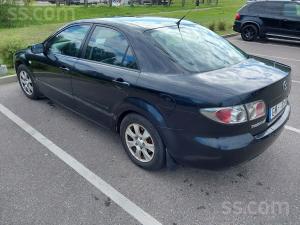 Red Mazda 6 2007 in Riga, with an engine capacity of 2.00 L and mileage of 231 thousand km for 3200 €, photo 6 on AUTOMOTO.COM.LV