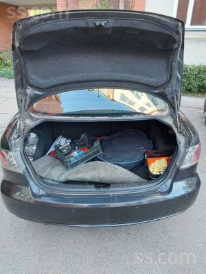 Red Mazda 6 2007 in Riga, with an engine capacity of 2.00 L and mileage of 231 thousand km for 3200 €, photo 7 on AUTOMOTO.COM.LV