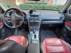 Red Mazda 6 2007 in Riga, with an engine capacity of 2.00 L and mileage of 231 thousand km for 3200 €, photo 8 on AUTOMOTO.COM.LV