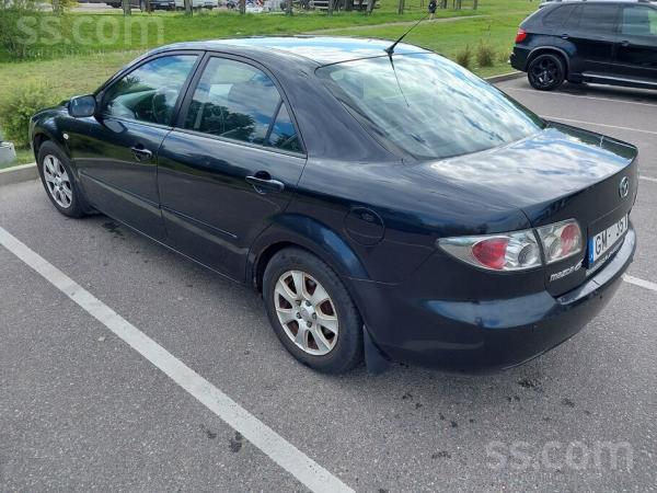 Red Mazda 6 2007 in Riga, with an engine capacity of 2.00 L and mileage of 231 thousand km for 3200 €, photo 6 on AUTOMOTO.COM.LV