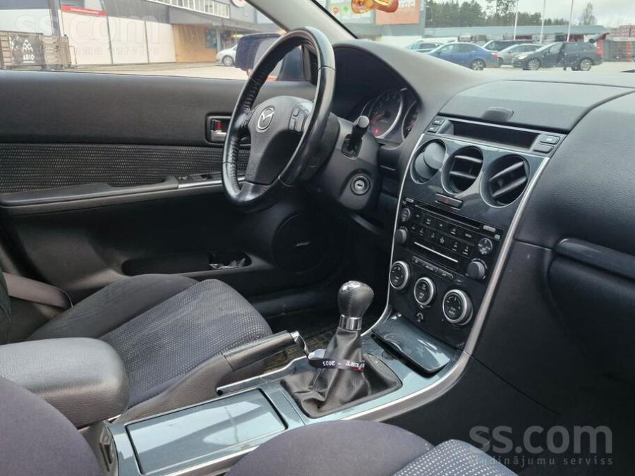 Red Mazda 6 2008 in Valmiera, with an engine capacity of 2.30 L and mileage of 204 thousand km for 1700 €, photo 5 on AUTOMOTO.COM.LV