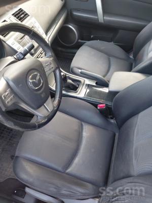 Red Mazda 6 2008 in Riga, with an engine capacity of 2.00 L and mileage of 377 thousand km for 1099 €, photo 7 on AUTOMOTO.COM.LV