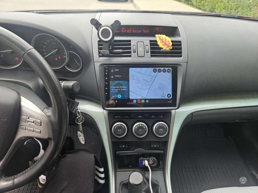 Red Mazda 6 2008 in Kaunas, with an engine capacity of 2.00 L and mileage of 246 thousand km for 3800 €, photo 9 on AUTOMOTO.COM.LV