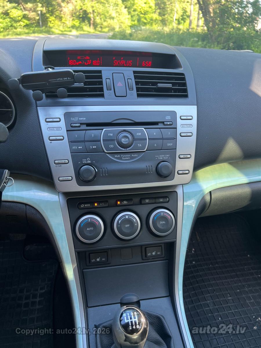 Red Mazda 6 2009 in Tallinn, with an engine capacity of 2.00 L and mileage of 316 thousand km for 890 €, photo 8 on AUTOMOTO.COM.LV