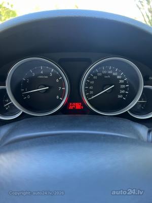 Red Mazda 6 2009 in Tallinn, with an engine capacity of 2.00 L and mileage of 316 thousand km for 890 €, photo 9 on AUTOMOTO.COM.LV