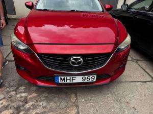 Red Mazda 6 2013 in Druskininkai, with an engine capacity of 2.20 L and mileage of 254 thousand km for 2400 €, photo 4 on AUTOMOTO.COM.LV