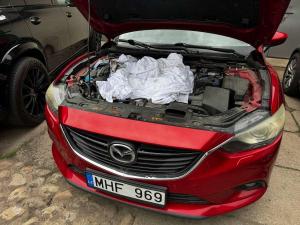 Red Mazda 6 2013 in Druskininkai, with an engine capacity of 2.20 L and mileage of 254 thousand km for 2400 €, photo 5 on AUTOMOTO.COM.LV