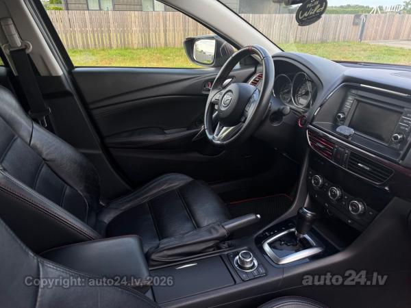 Red Mazda 6 2013 in Tallinn, with an engine capacity of 2.20 L and mileage of 301 thousand km for 6499 €, photo 8 on AUTOMOTO.COM.LV