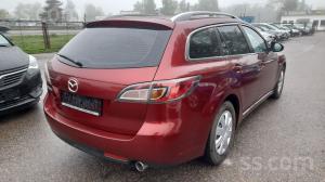 Red Mazda 6 2009 in Riga, with an engine capacity of 1.80 L and mileage of 258 thousand km for 3500 €, photo 10 on AUTOMOTO.COM.LV