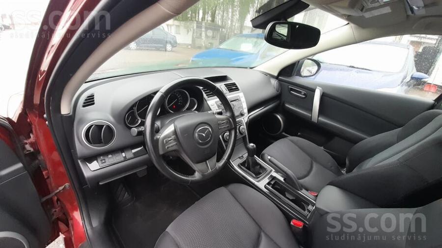Red Mazda 6 2009 in Riga, with an engine capacity of 1.80 L and mileage of 258 thousand km for 3500 €, photo 16 on AUTOMOTO.COM.LV
