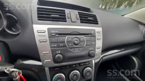 Red Mazda 6 2009 in Riga, with an engine capacity of 1.80 L and mileage of 258 thousand km for 3500 €, photo 18 on AUTOMOTO.COM.LV