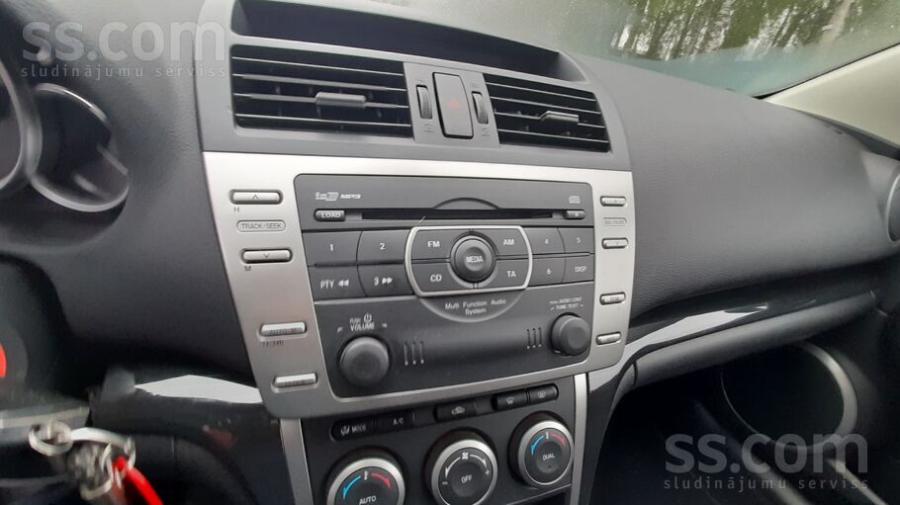 Red Mazda 6 2009 in Riga, with an engine capacity of 1.80 L and mileage of 258 thousand km for 3500 €, photo 18 on AUTOMOTO.COM.LV