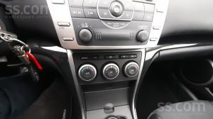 Red Mazda 6 2009 in Riga, with an engine capacity of 1.80 L and mileage of 258 thousand km for 3500 €, photo 19 on AUTOMOTO.COM.LV