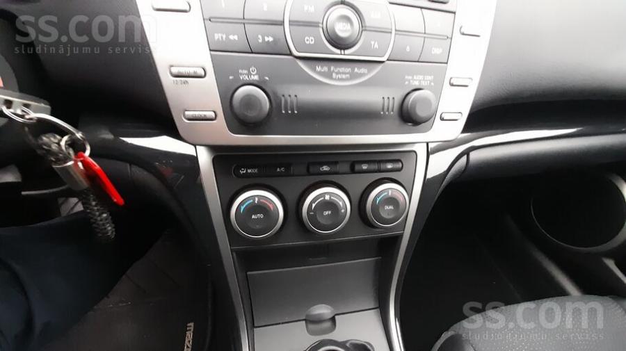Red Mazda 6 2009 in Riga, with an engine capacity of 1.80 L and mileage of 258 thousand km for 3500 €, photo 19 on AUTOMOTO.COM.LV