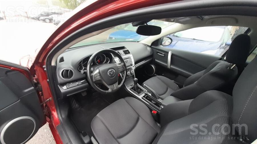 Red Mazda 6 2009 in Riga, with an engine capacity of 1.80 L and mileage of 258 thousand km for 3500 €, photo 21 on AUTOMOTO.COM.LV