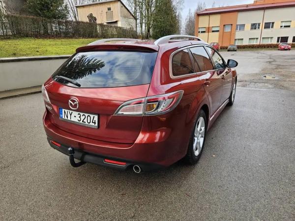 Red Mazda 6 2010 in Jekabpils, with an engine capacity of 2.20 L and mileage of 247 thousand km for 2390 €, photo 6 on AUTOMOTO.COM.LV