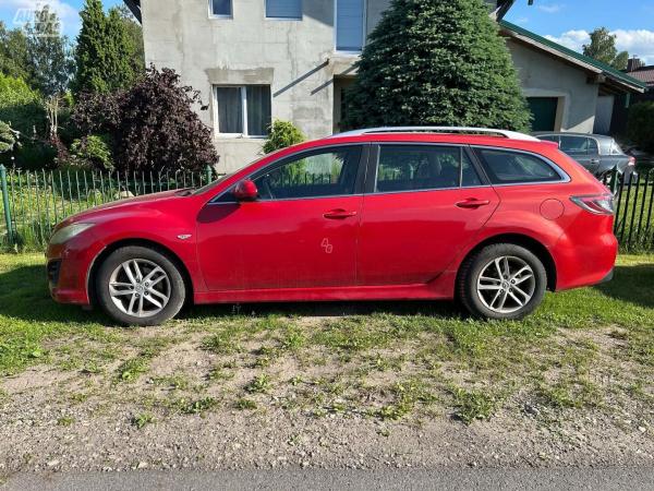 Red Mazda 6 2011 in Kaunas, with an engine capacity of 2.20 L and mileage of 273 thousand km for 1300 €, photo 6 on AUTOMOTO.COM.LV
