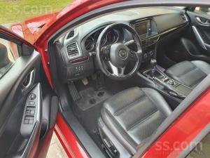 Red Mazda 6 2013 in Bauska, with an engine capacity of 2.20 L and mileage of 212 thousand km for 4950 €, photo 12 on AUTOMOTO.COM.LV