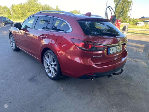 Red Mazda 6 2013 in Rokiskis, with an engine capacity of 2.18 L and mileage of 260 thousand km for 4499 €, photo 1 on AUTOMOTO.COM.LV