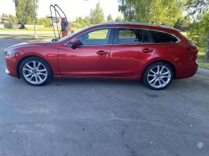 Red Mazda 6 2013 in Rokiskis, with an engine capacity of 2.18 L and mileage of 260 thousand km for 4499 €, photo 5 on AUTOMOTO.COM.LV