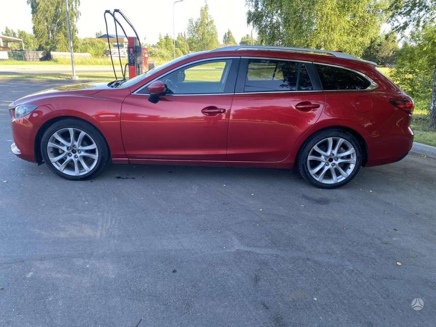 Red Mazda 6 2013 in Rokiskis, with an engine capacity of 2.18 L and mileage of 260 thousand km for 4499 €, photo 5 on AUTOMOTO.COM.LV