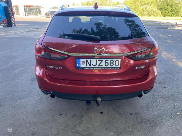 Red Mazda 6 2013 in Rokiskis, with an engine capacity of 2.18 L and mileage of 260 thousand km for 4499 €, photo 5 on AUTOMOTO.COM.LV