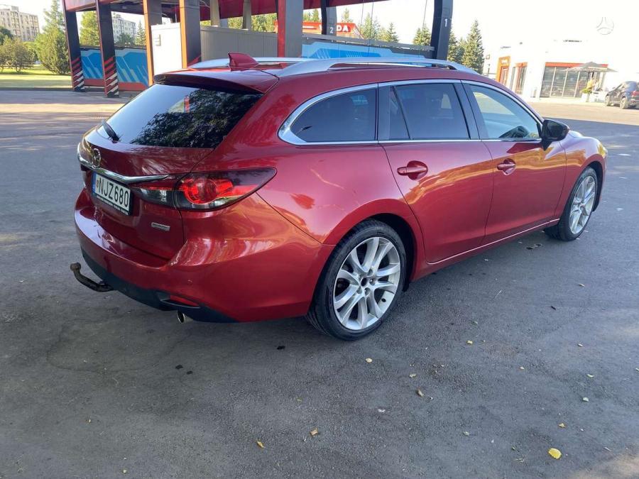 Red Mazda 6 2013 in Rokiskis, with an engine capacity of 2.18 L and mileage of 260 thousand km for 4499 €, photo 8 on AUTOMOTO.COM.LV