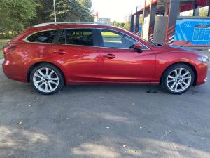 Red Mazda 6 2013 in Rokiskis, with an engine capacity of 2.18 L and mileage of 260 thousand km for 4499 €, photo 9 on AUTOMOTO.COM.LV