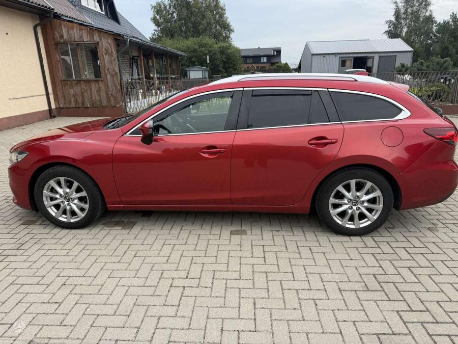 Red Mazda 6 2013 in Taurage, with an engine capacity of 2.18 L and mileage of 186 thousand km for 4900 €, photo 4 on AUTOMOTO.COM.LV