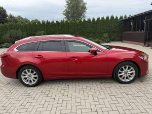Red Mazda 6 2013 in Taurage, with an engine capacity of 2.18 L and mileage of 186 thousand km for 4900 €, photo 8 on AUTOMOTO.COM.LV