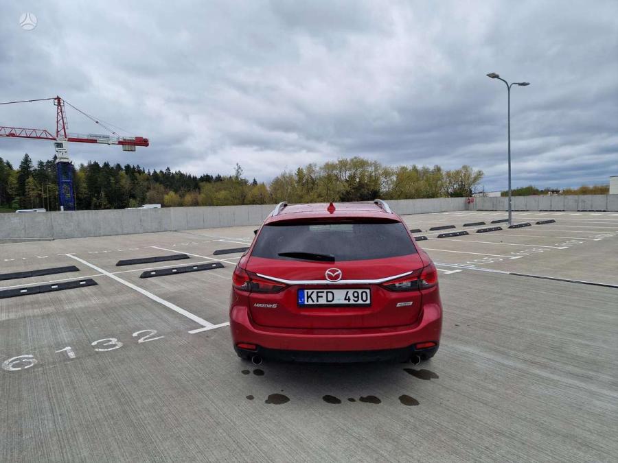 Red Mazda 6 2014 in Siauliai, with an engine capacity of 2.18 L and mileage of 275 thousand km for 6500 €, photo 4 on AUTOMOTO.COM.LV