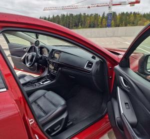 Red Mazda 6 2014 in Siauliai, with an engine capacity of 2.18 L and mileage of 275 thousand km for 6500 €, photo 9 on AUTOMOTO.COM.LV
